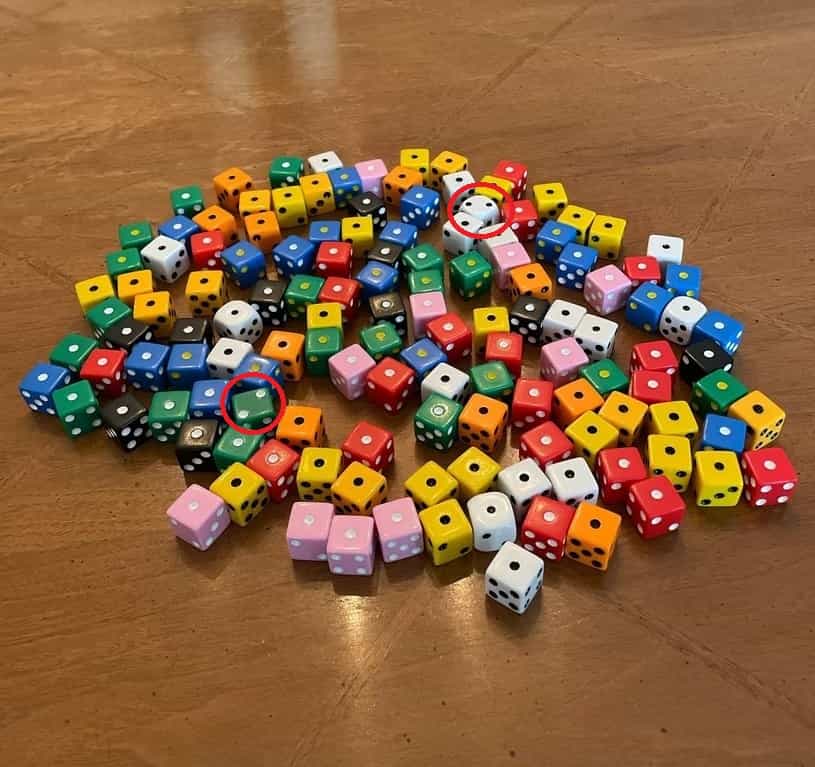 Optical Illusion: Can you spot two odd dice in the picture in 7 seconds?